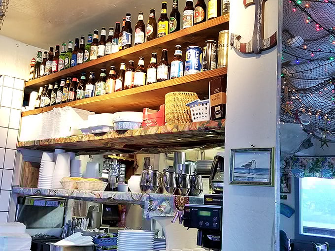 The impressive beer bottle lineup stands at attention, ready to complement your seafood feast. Each bottle tells a story of craft and tradition.