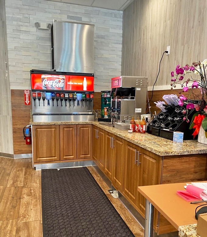 The self-serve beverage station &ndash; where unlimited refills meet the sudden realization that you might need to pace yourself.