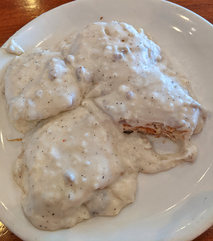 Biscuits and gravy that would make your Southern grandmother nod in approval. A plate of pure comfort that hugs you from the inside.