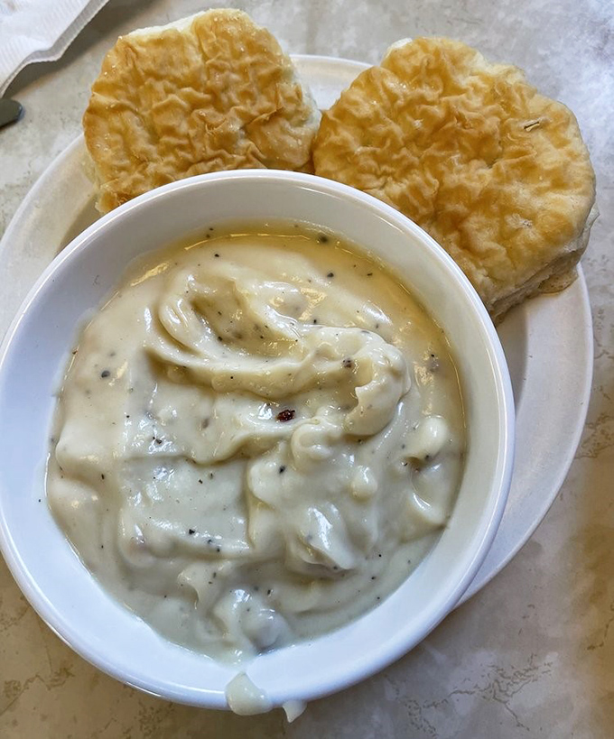 Biscuits standing at attention, ready for their baptism in creamy pepper-flecked gravy&mdash;a Southern tradition honored in California style.