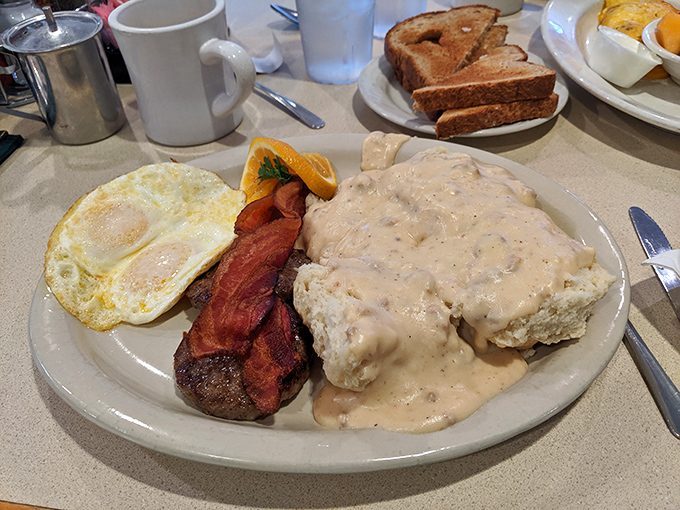 Biscuits and gravy with eggs and bacon&mdash;a breakfast so hearty it makes you wonder why brunch needed to get all fancy in the first place.