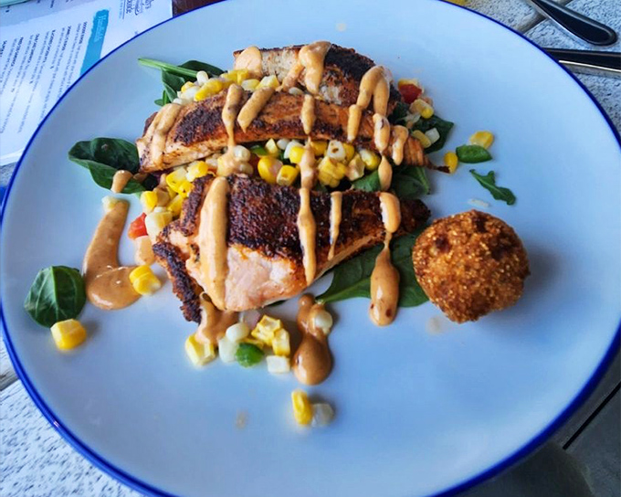 Blackened salmon that proves sometimes the best flavor combinations are the simplest&mdash;fish, corn, greens, and a sauce worth licking off the plate.