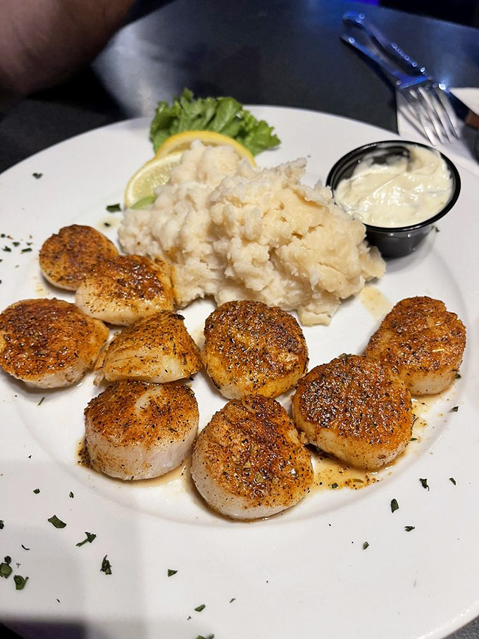 Blackened scallops that look like they're auditioning for a food magazine cover &ndash; perfectly seared and ready for their close-up.