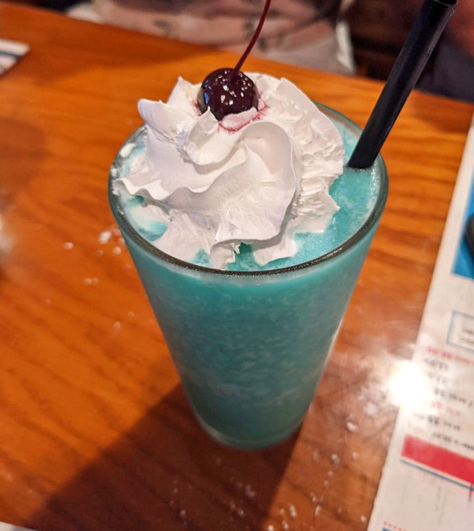 The Blue Coconut&mdash;a drink that looks like it borrowed its color palette from the Gulf waters. Vacation in a glass.