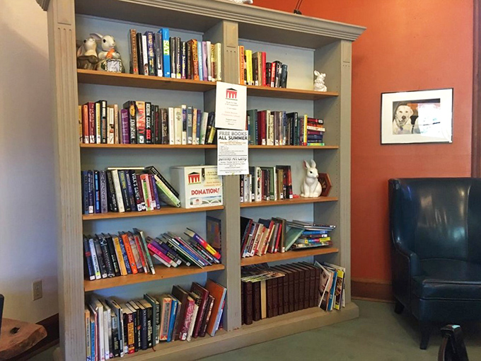 The community bookshelf&mdash;where you can borrow a novel to justify lingering over that second pastry. Literary indulgence meets culinary indulgence.