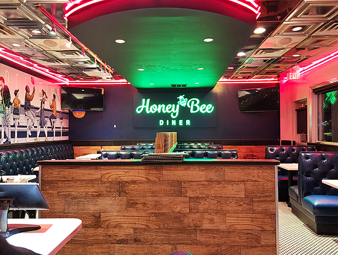 The green glow of the Honey Bee sign bathes the dining room in a warm hue that says, "Yes, you can have breakfast for dinner."