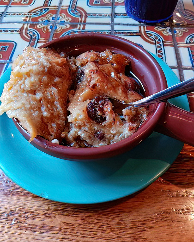 Bread pudding that's achieved that perfect balance between structure and surrender. Comfort food that hugs you from the inside out.