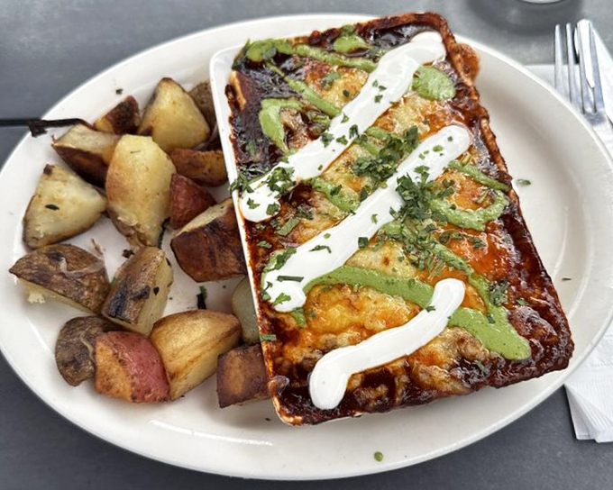 This isn't just breakfast &ndash; it's a savory masterpiece topped with avocado and sour cream that makes morning meetings worth canceling.