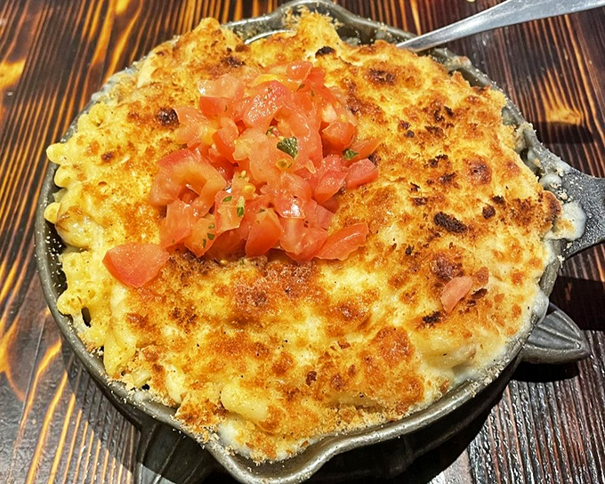 Mac and cheese that's achieved the perfect golden crust&mdash;the culinary equivalent of winning the lottery. Those diced tomatoes add a fresh pop of color and flavor.