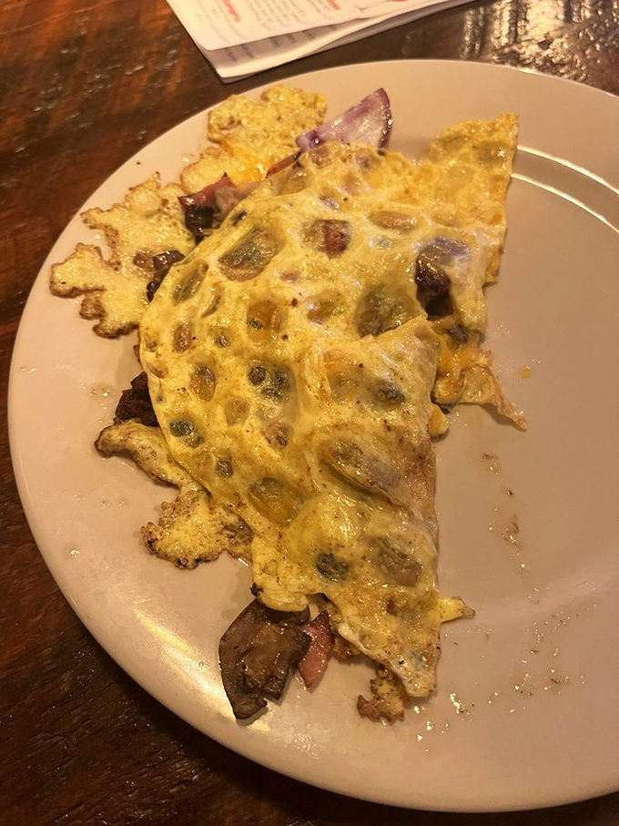 An omelet that's seen things&mdash;namely cheese, vegetables, and possibly the meaning of breakfast perfection. Morning glory on a plate.