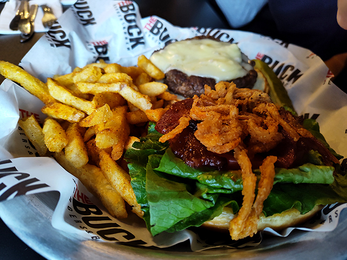 The signature Buck burger - a towering tribute to everything great about American comfort food done right.