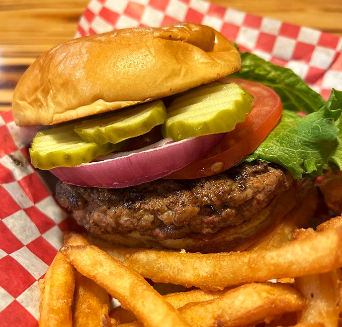 A burger that doesn't need Instagram filters to look good. Thick, juicy, and adorned with the classics&mdash;proof that innovation isn't always necessary.