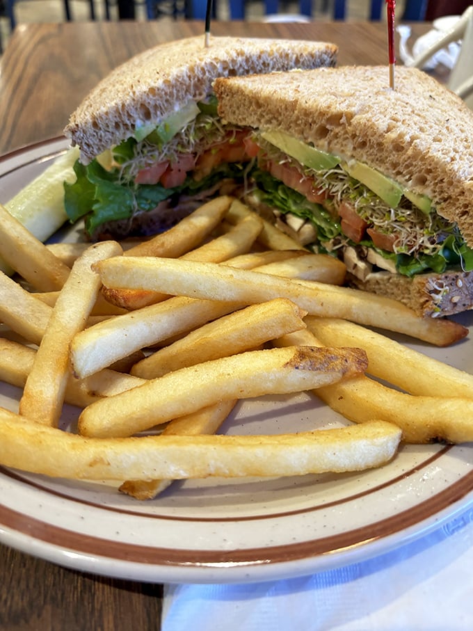 Sprouts, avocado, and fresh veggies make this sandwich the kind of healthy choice you can actually get excited about.