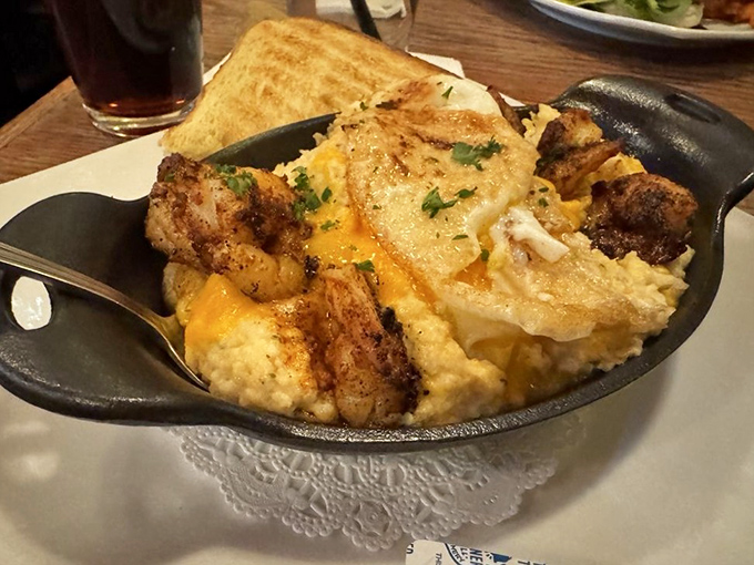 Creamy grits cradling blackened shrimp and melted cheese&mdash;Southern comfort food that found its way north and decided to stay permanently.