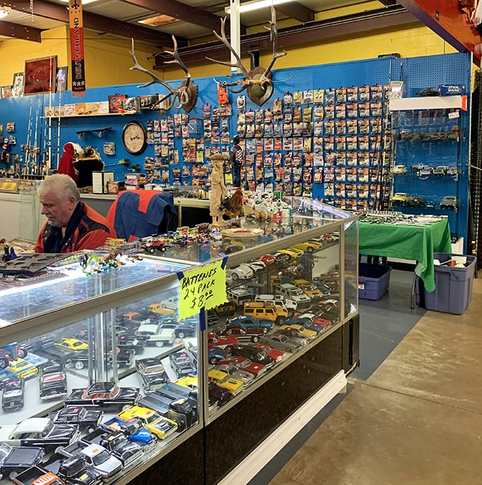 This vendor clearly never outgrew his Hot Wheels phase, and thank goodness for that. Decades of automotive history displayed with curatorial precision.
