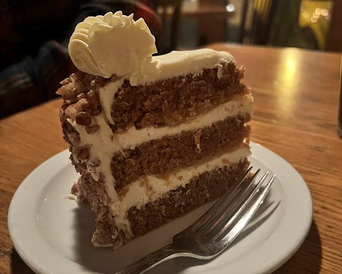 Carrot cake that doesn't mess around&mdash;three glorious layers with cream cheese frosting so perfect it makes you question why other desserts even try.