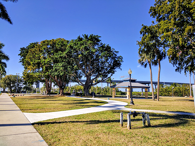 Centennial Park offers breathing room in the urban landscape, where pathways invite leisurely strolls and trees provide nature's air conditioning.