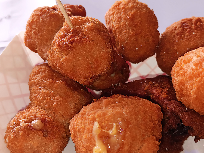 These cheese balls aren't just appetizers&mdash;they're golden orbs of molten joy that make a convincing case for deep-frying as an art form.