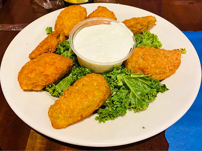 Golden-fried jalape&ntilde;o poppers arranged in a perfect circle, like a spicy, cheese-filled crown for your taste buds' coronation.