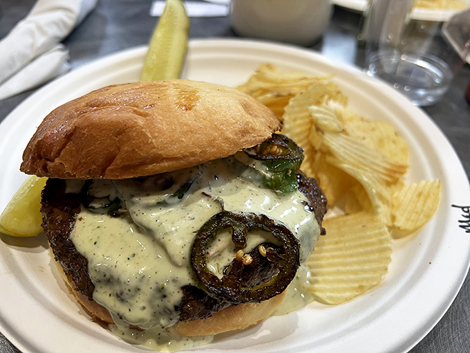 A burger that requires both hands and several napkins. Those grilled jalape&ntilde;os aren't just for show&mdash;they mean delicious business.