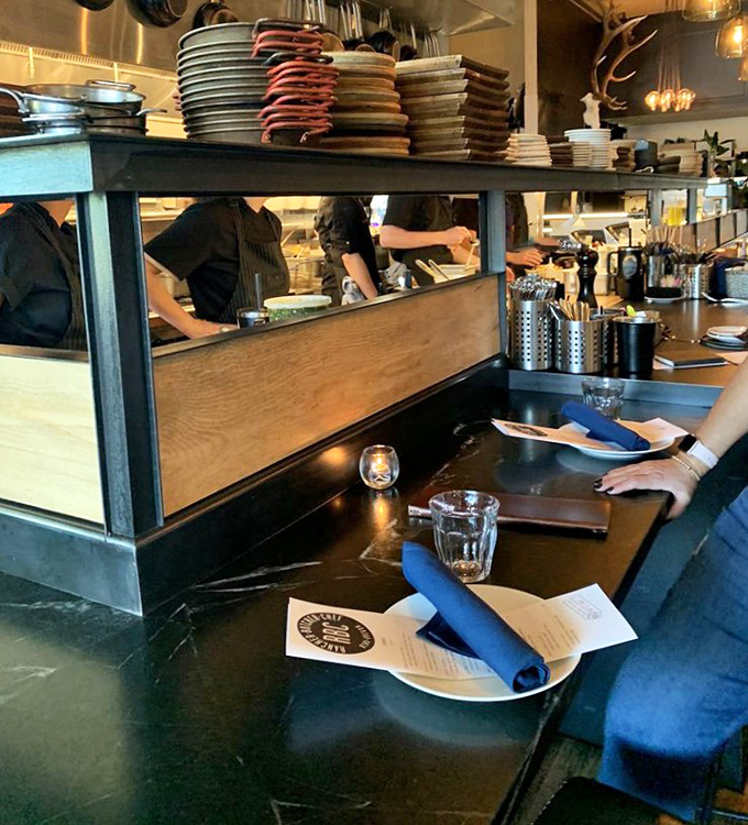 The chef's counter&mdash;where curious diners get the director's cut version of dinner. Front-row seats to culinary theater are always worth the ticket.