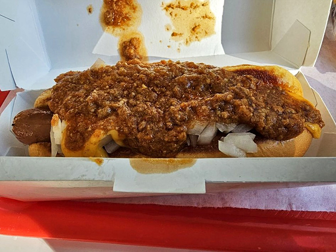 The chili cheese dog&mdash;where messy meets magnificent. This handheld masterpiece demands both napkins and your undivided attention.