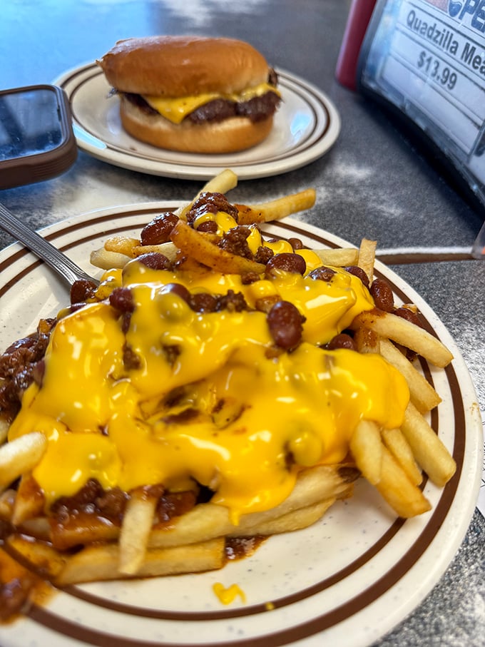 Chili cheese fries that make you question why you ever ate anything else. That cheese-to-chili ratio deserves a Nobel Prize in physics.