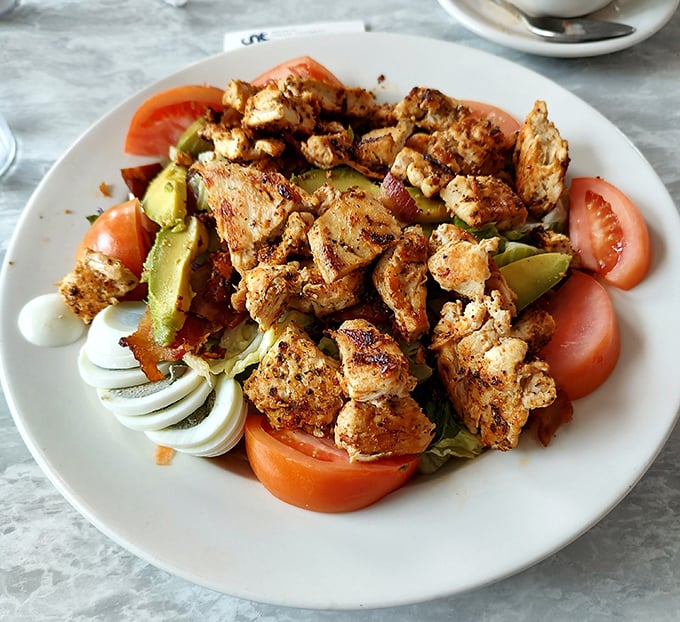 This isn't just a salad; it's protein with purpose. Seasoned chicken chunks nestled among fresh vegetables&mdash;a healthy choice that doesn't sacrifice flavor.