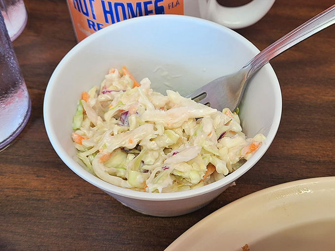 Even the coleslaw gets the respect it deserves &ndash; crisp, tangy, and refreshingly honest.