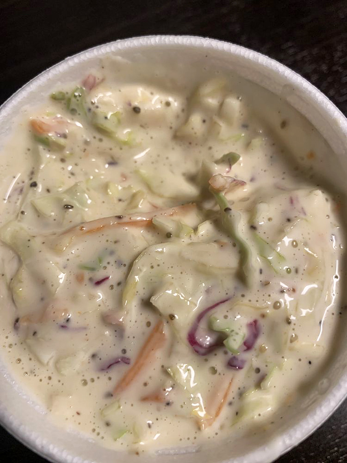 This isn't just coleslaw&mdash;it's a creamy, crunchy counterpoint to all that smoky meat, with hints of purple onion playing hide and seek.