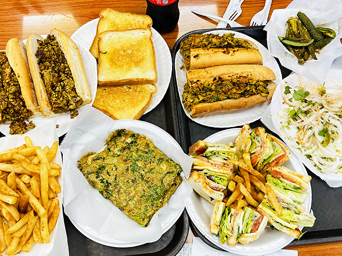 A feast spread across multiple plates shows Little Sicily's commitment to feeding people properly and generously.