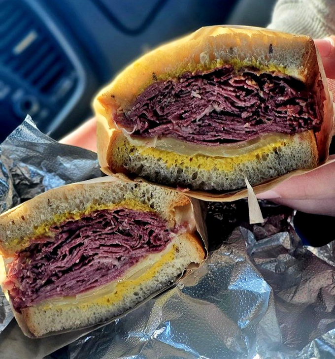 Corned beef piled high enough to make even the most dedicated carnivore pause in respectful admiration.