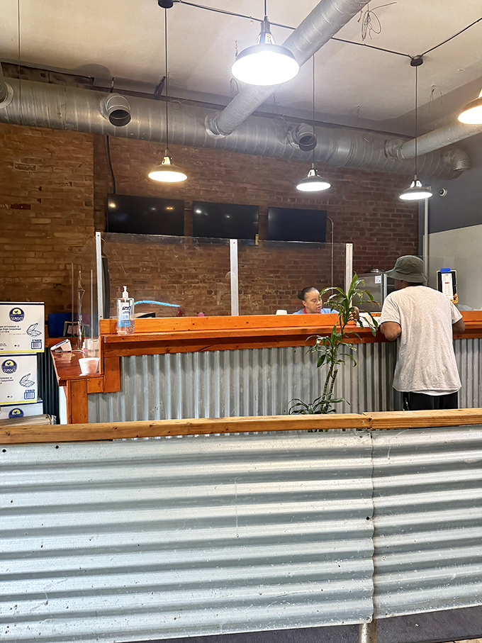 Industrial chic meets barbecue functionality. This counter has witnessed countless "first bite" expressions of pure joy.