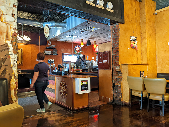 The counter area – where coffee dreams come true and friendly faces remember your usual before you even ask.