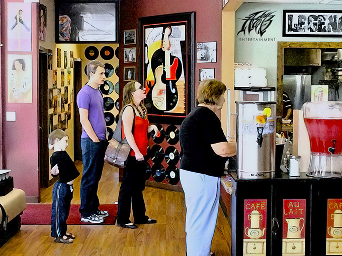 Music memorabilia transforms a simple counter into a cultural experience. Even waiting for your order becomes an adventure in nostalgia.