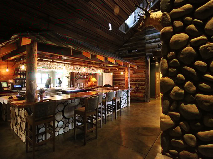 Stone walls meet wooden beams in this rustic paradise. The bar's design makes you feel like you've stumbled upon a secret mountain hideaway.