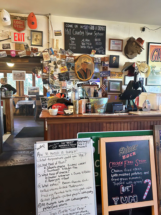 Every inch of wall space tells a story—from beer signs to cowboy hats. It's not decoration; it's a three-dimensional Texas history lesson.