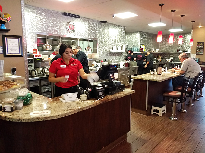 At the counter, efficiency meets hospitality as staff members transform orders into experiences, one plate at a time.