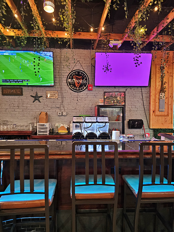 Wooden beams, hanging greenery, and plenty of screens &ndash; because missing the game while cracking crabs would be a Maryland sin.