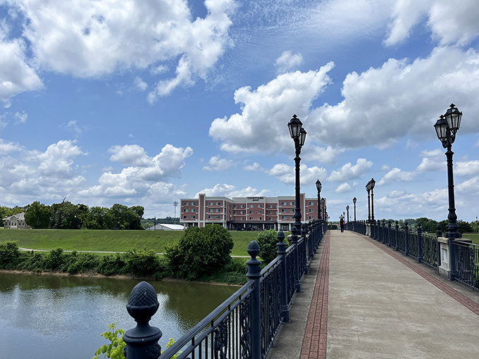 This elegant riverside walkway with its ornate lampposts feels like a movie set where the romantic comedy's pivotal scene unfolds.