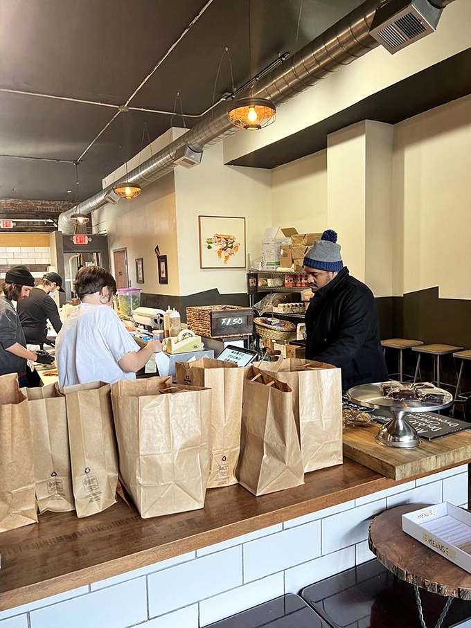 The lunch rush in full swing – paper bags standing at attention, ready to transport handcrafted deliciousness to lucky recipients across Cleveland.
