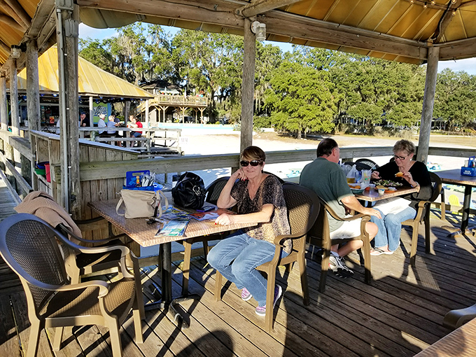 Outdoor dining where the lake breeze does the air conditioning and every table feels like the best seat in the house.