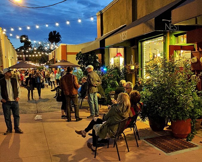 The Artisan Alley Farmers Market transforms into a twinkling social hub at dusk, where food, friends, and Florida evenings create magic.