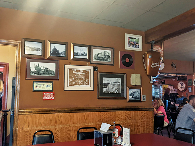 The walls tell stories of local history through carefully curated photographs, creating a sense of place that chain restaurants can only dream about.