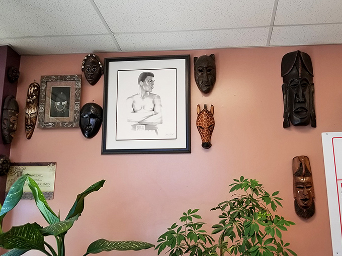 African masks and greenery add character to the walls. Every great barbecue joint needs personality—B&K delivers in both food and atmosphere.
