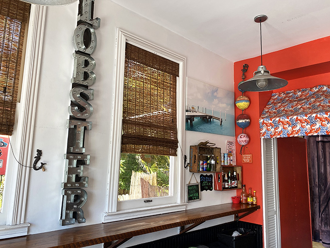 That vertical "LOBSTER" sign isn't just decor—it's a lighthouse guiding hungry souls to their seafood destiny.