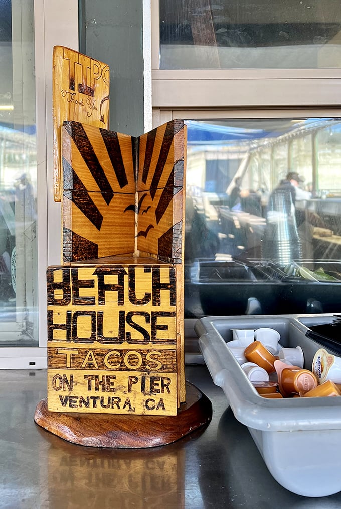 Handcrafted wooden signs that say "we care too much about our food to waste money on fancy decor." Priorities perfectly aligned.