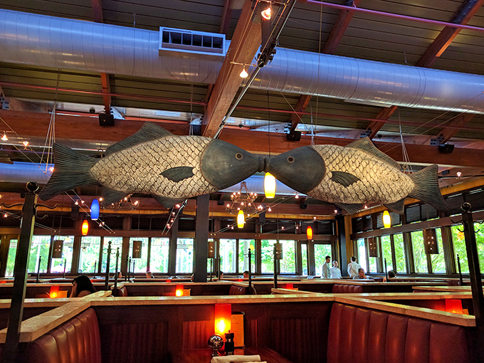 Those suspended fish sculptures aren't just decor; they're guardians of good taste, silently judging anyone who orders their steak well-done.