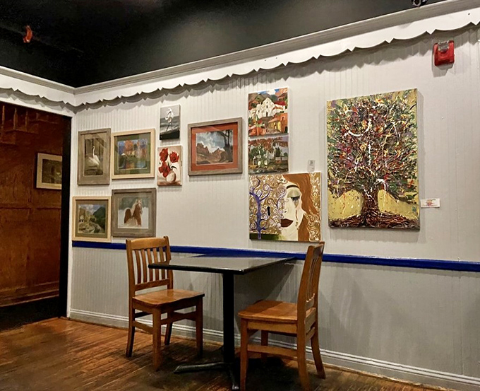 Local artwork adorns the walls, transforming dining spaces into galleries celebrating Baltimore's creative community spirit.