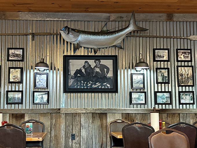 That mounted fish watching over diners seems to say, "You made the right choice coming here." The wall of memories below creates the perfect river atmosphere.